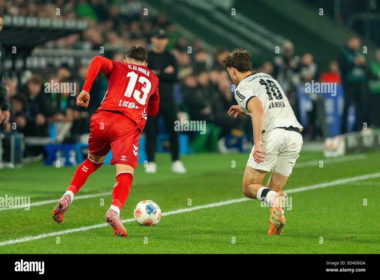 Philipp Sander (Borussia Borussia Monchengladbach, #16) in a running duel with Said El Mala (FC ...