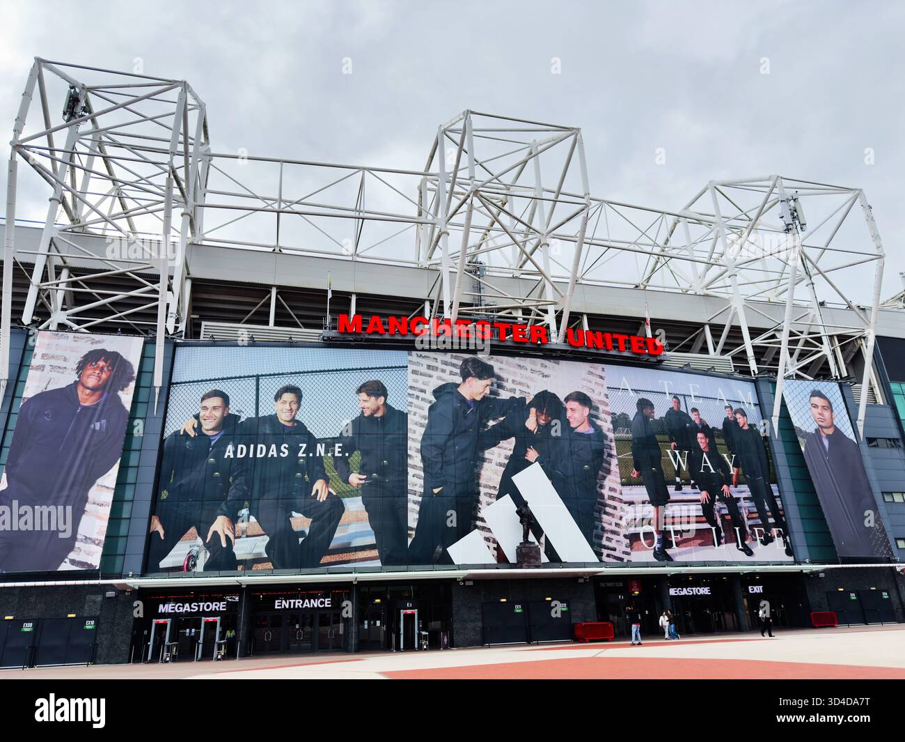 Manchester, UK - September 30, 2025: A modern stadium facade in ...