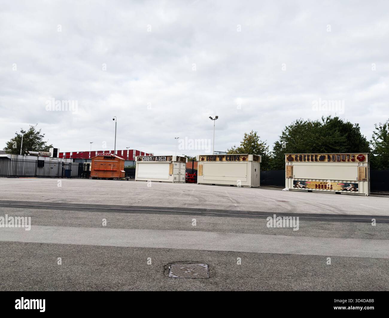 Manchester, UK - September 30, 2025: Open food stalls line a parking ...