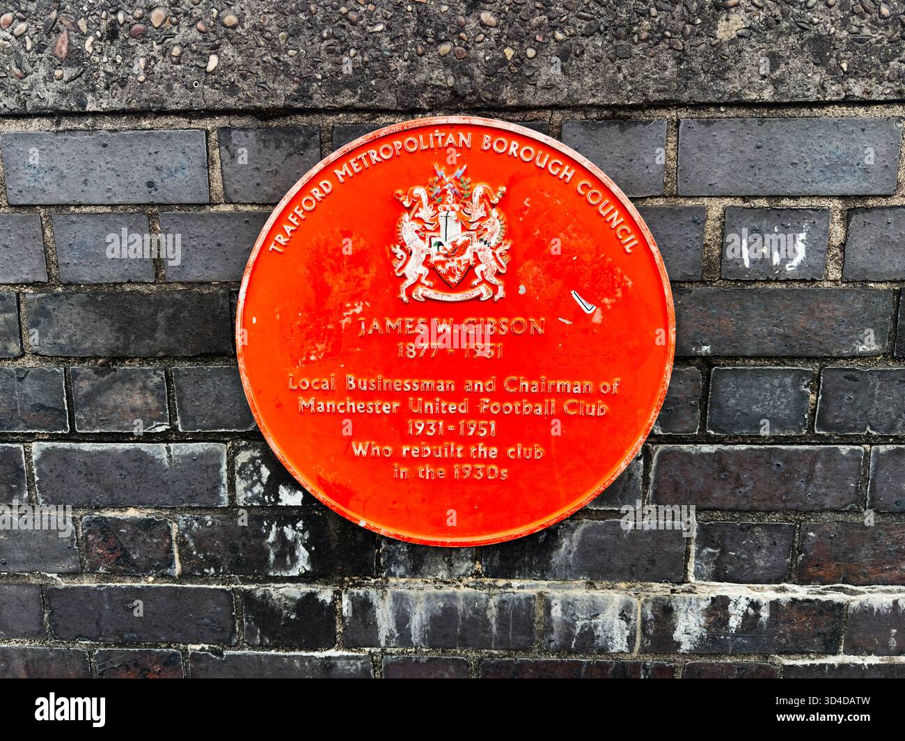 Manchester, UK - September 30, 2025: Historic red plaque on a brick ...