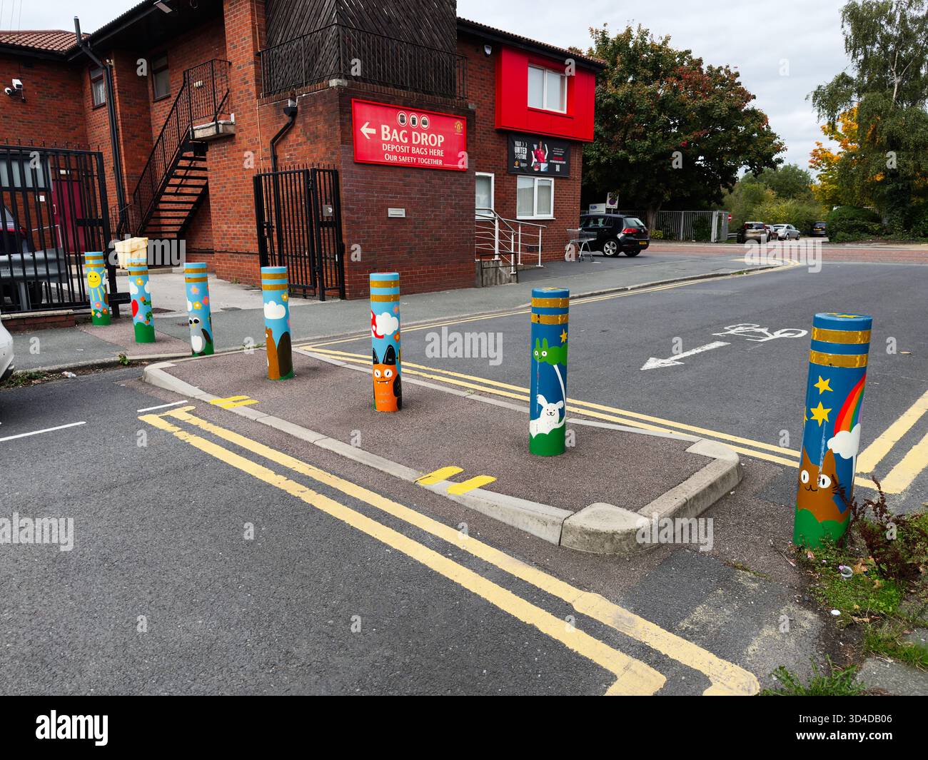Manchester, UK - September 30, 2025: Colorful bollards decorated with ...