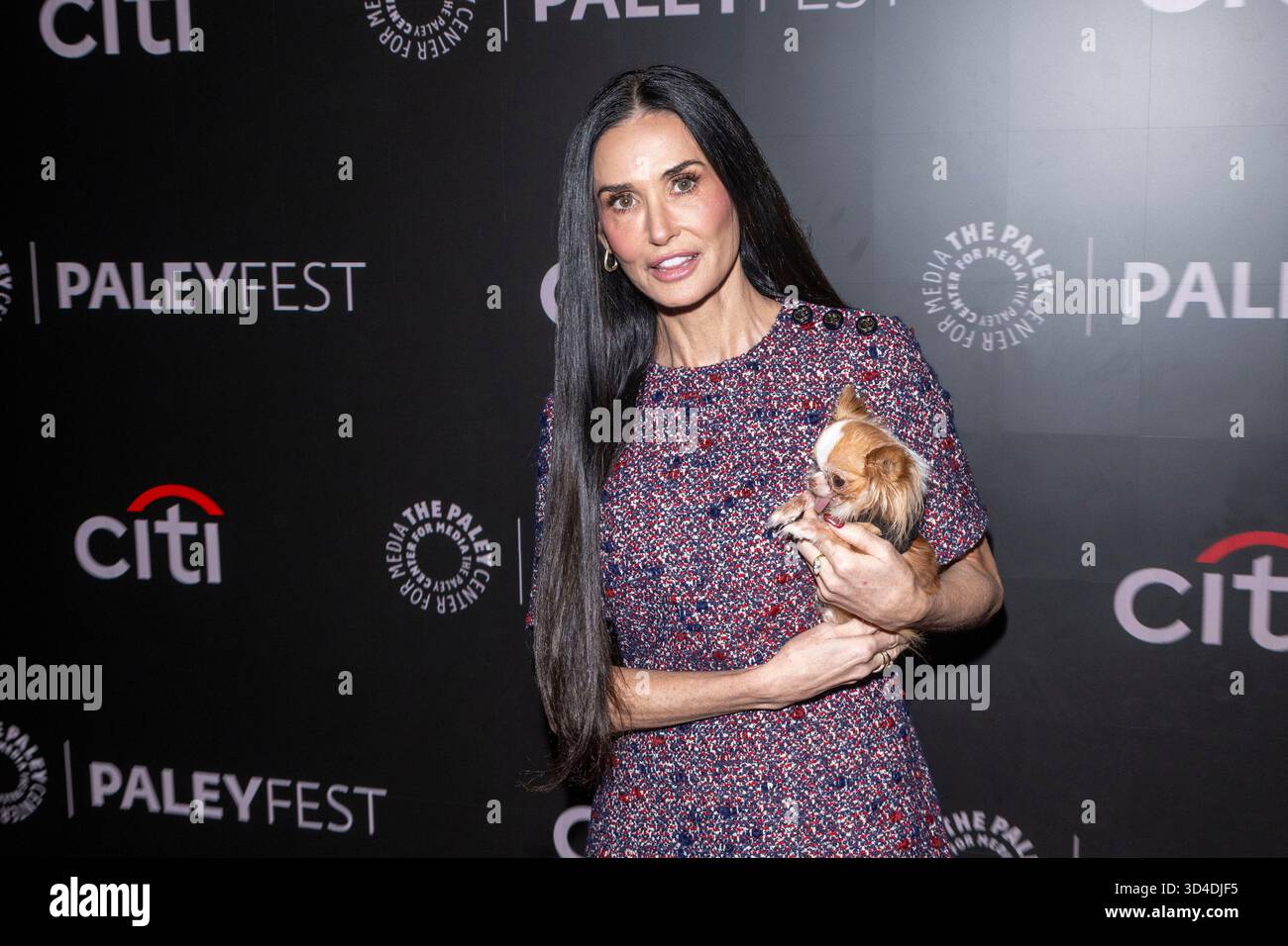 Demi Moore holding her dog Pilaf attends Paramount+'s "Landman" during ...