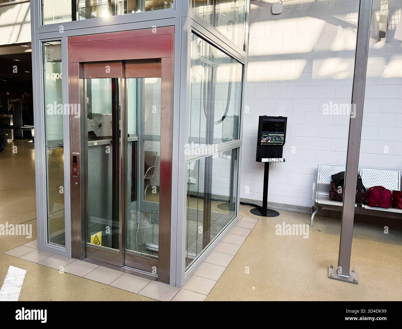 Nowy Dwor Mazowiecki, Poland - October 22, 2025: Modern glass elevator ...