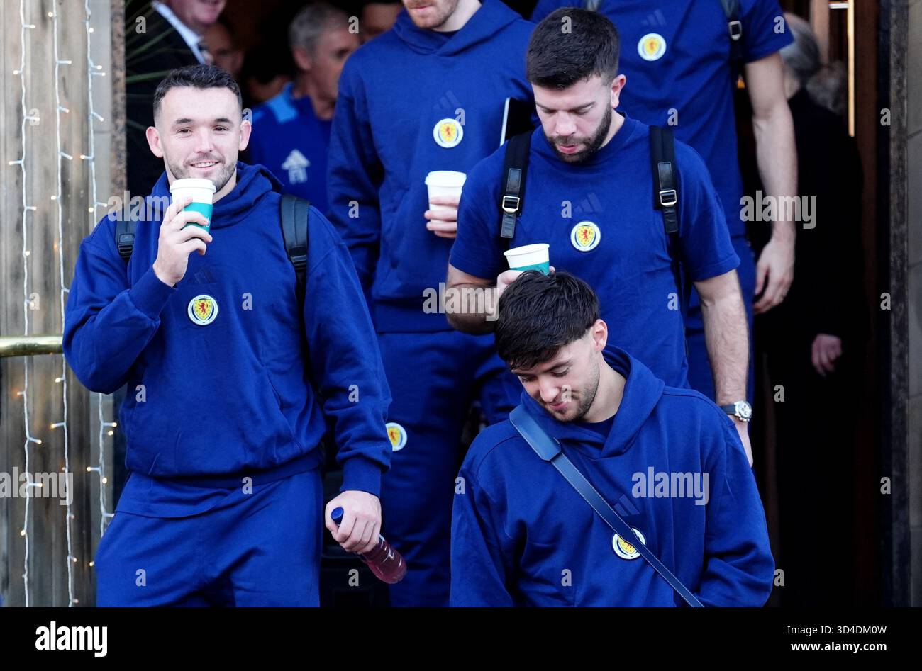 Scotland's John McGinn and Grant Hanley leaving the team hotel in ...