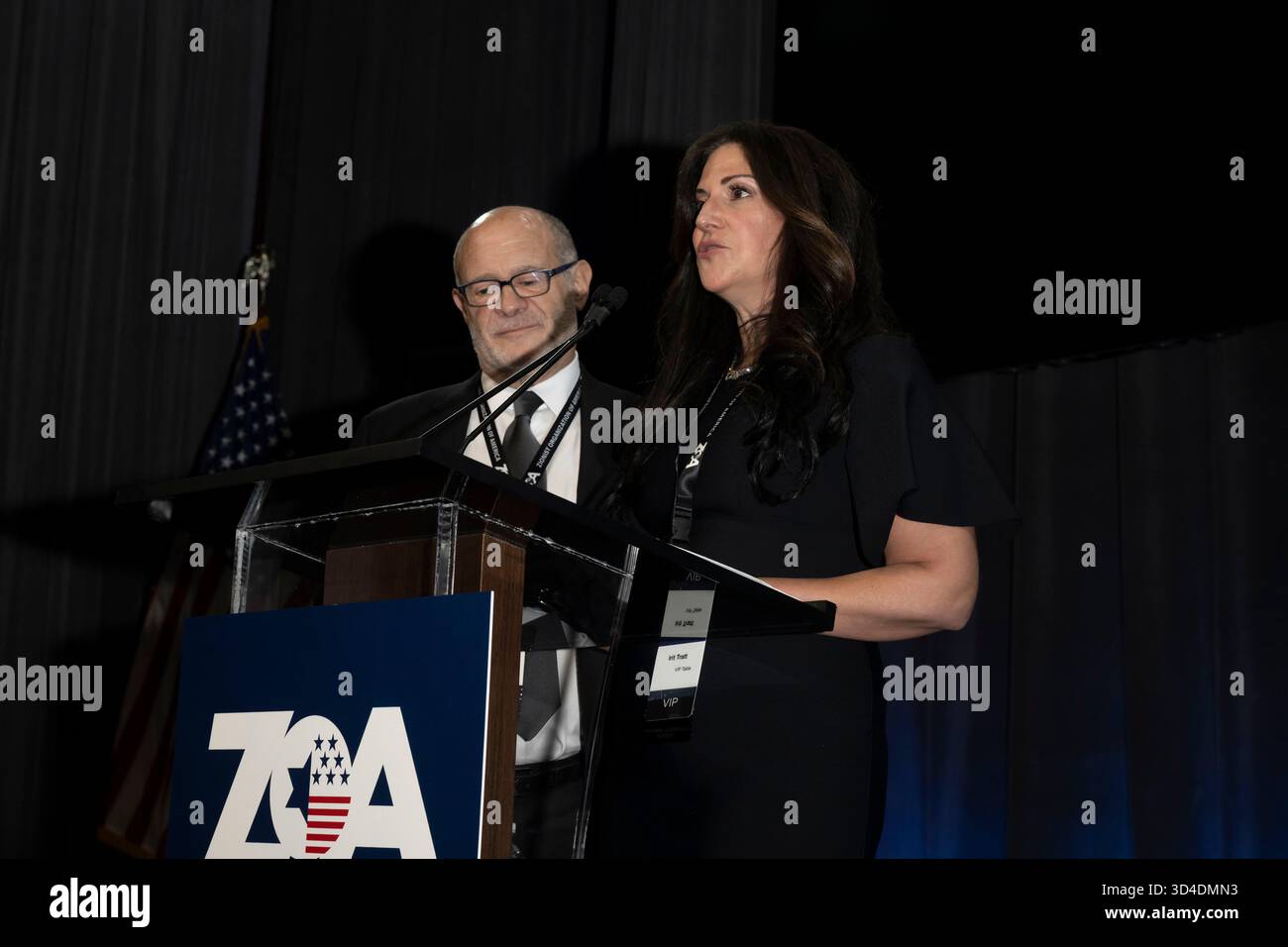 (L-R) Jonathan Tratt and Irit Tratt speak at the Zionist Organization ...