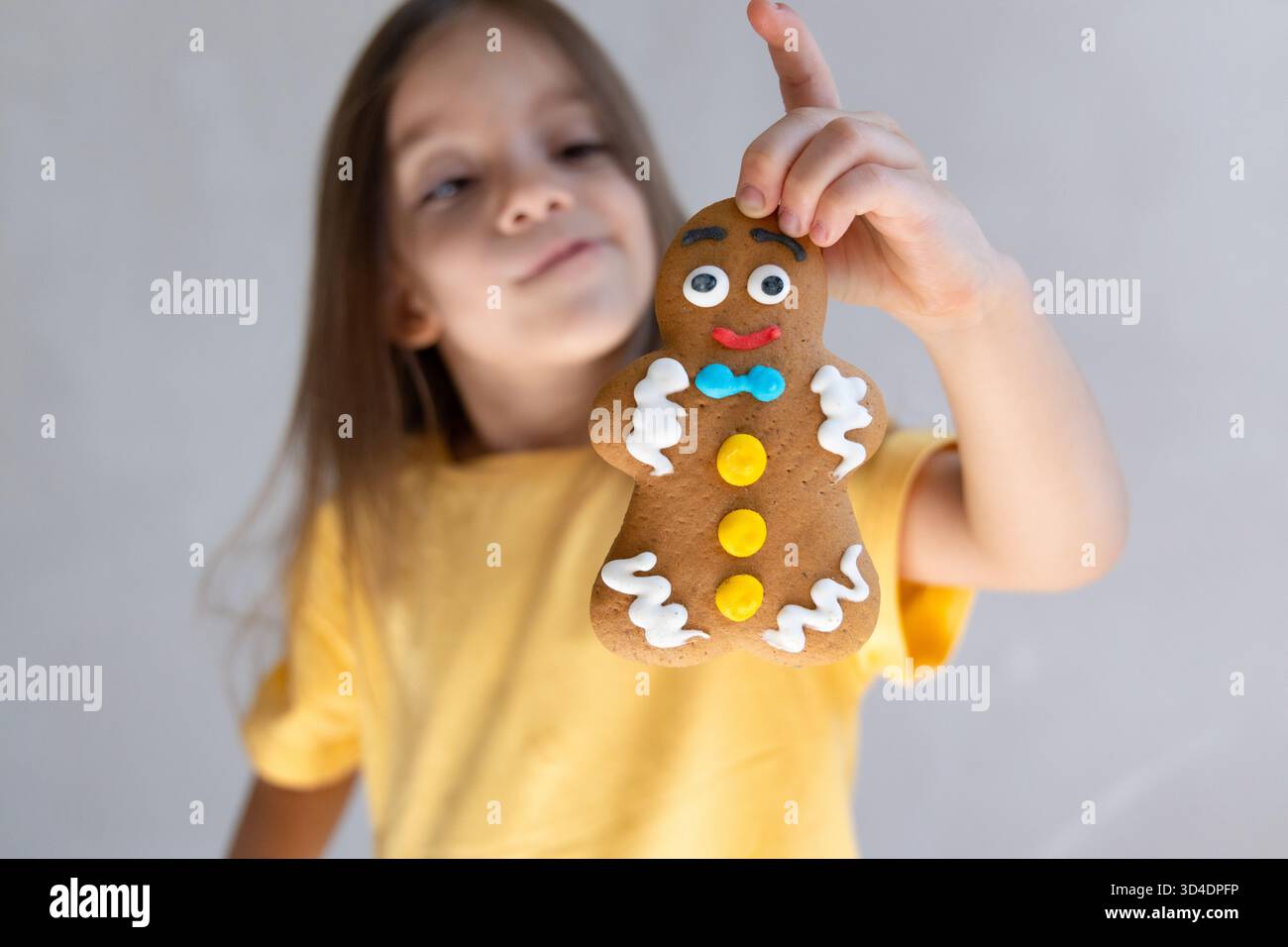 Gingerbread man, kid holding gingerbread man cookie in hands Stock ...