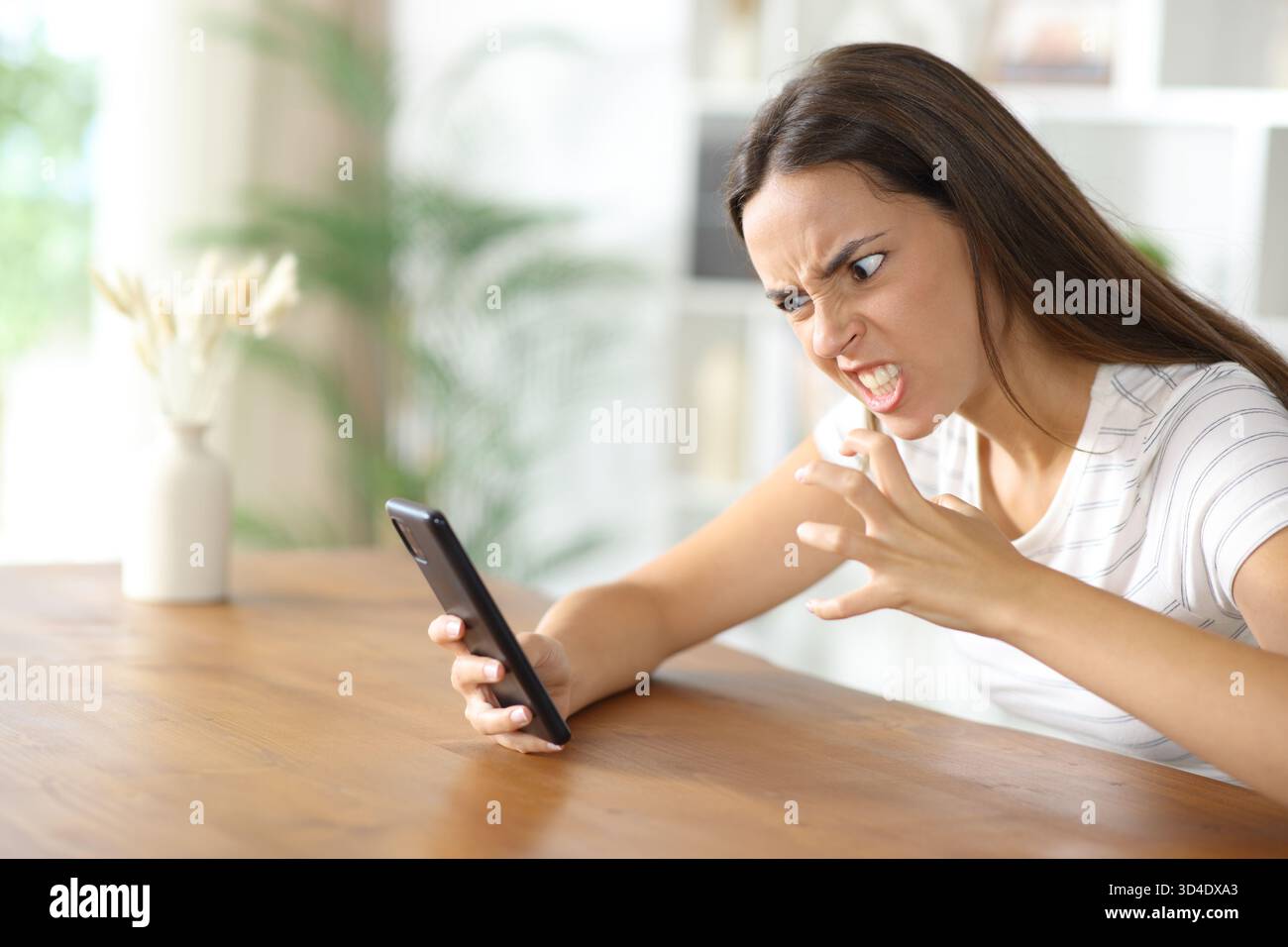 Angry woman consulting annoying hi-res stock photography and images - Alamy