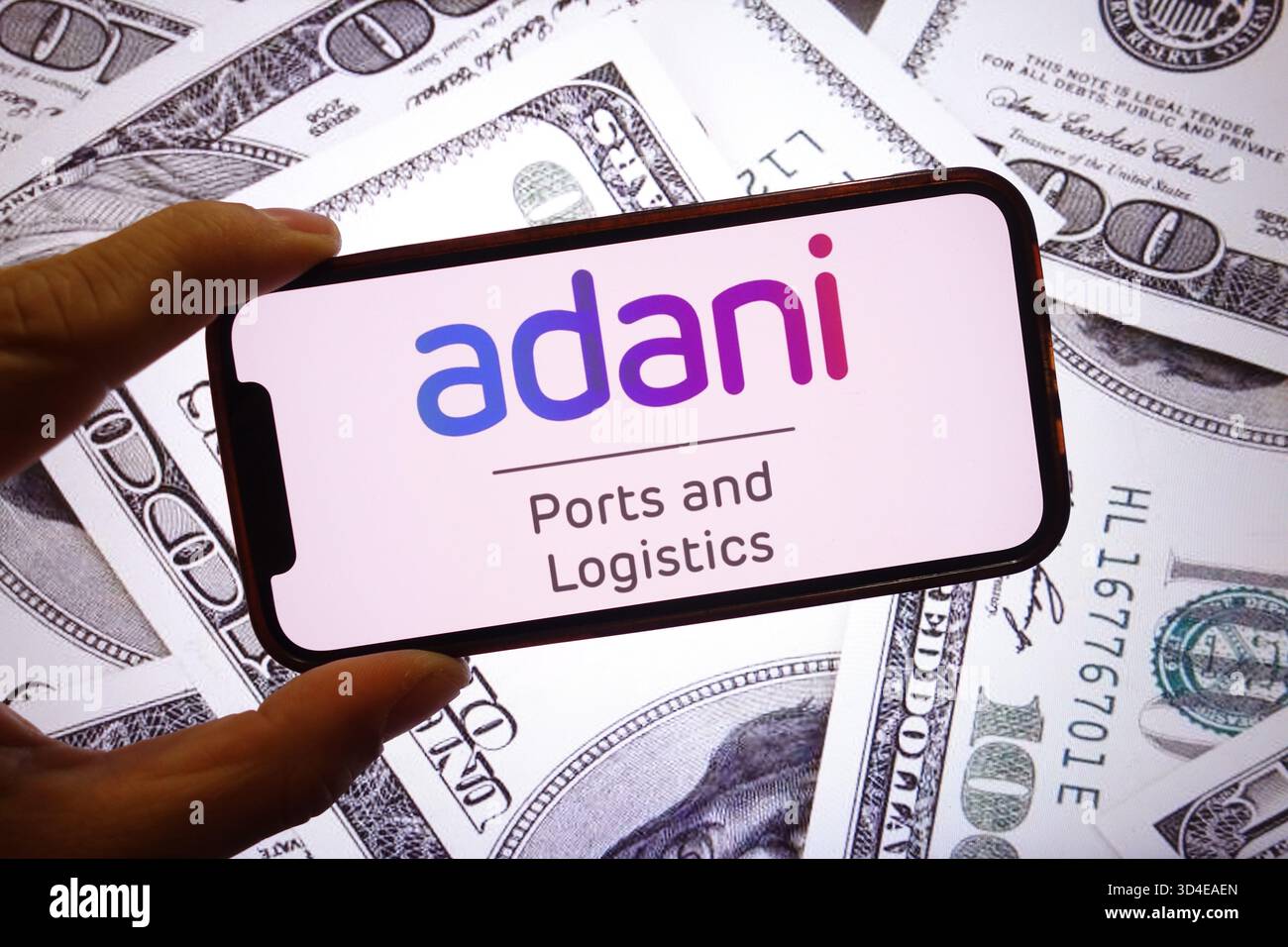 In this photo illustration, the Adani Ports and SEZ company logo is ...