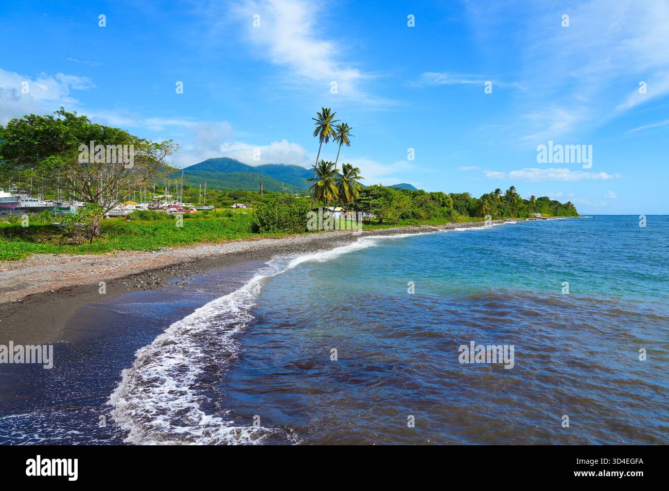 Black Sand Beach and Boatyard in New Guinea town on the west coast of ...