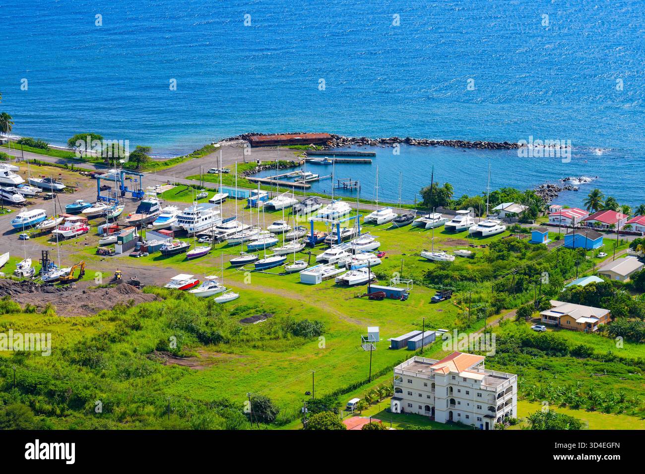 Boatyard and dry-dock boat storage in New Guinea town on the west coast ...