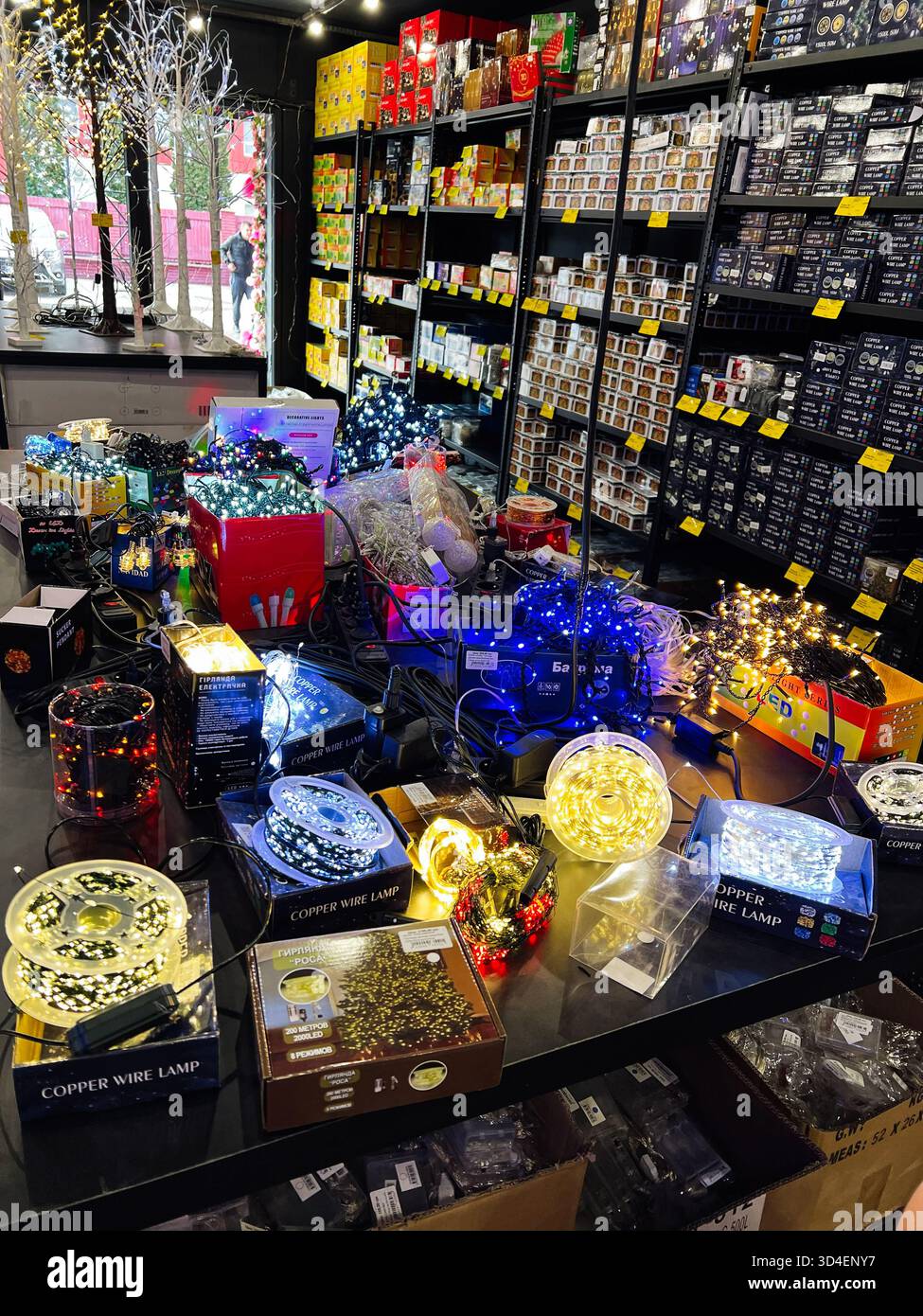 Kyiv, Ukraine - November 10, 2025: A busy shop filled with copper wire ...