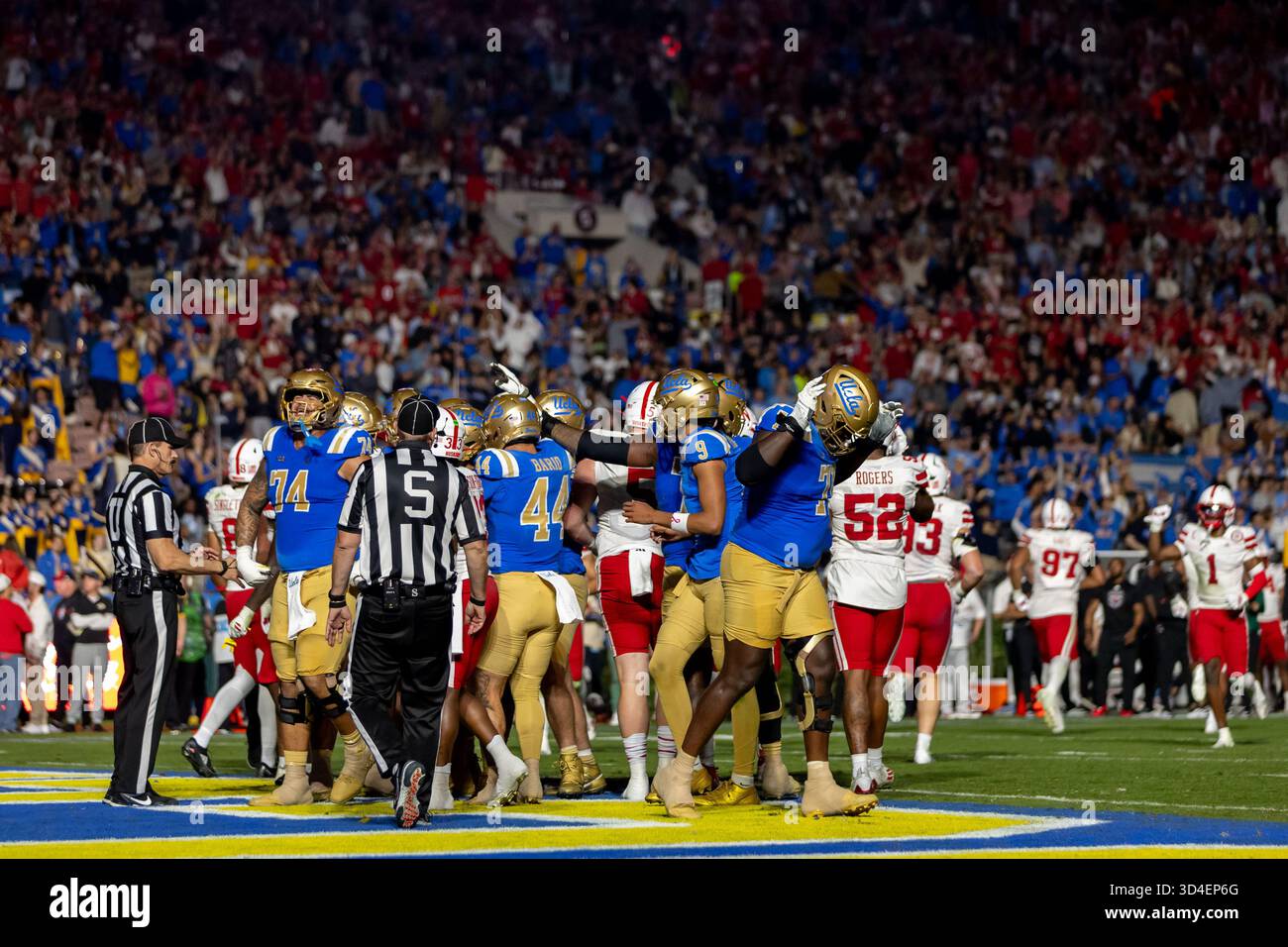 UCLA celebrates after scoring a touchdown during the first half of an ...