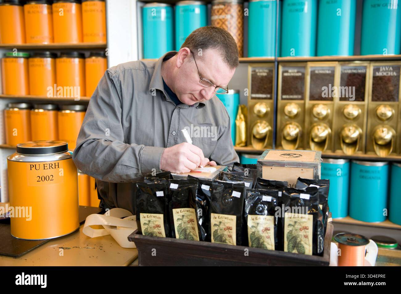 Owner Coffee & Tea Store. Portrait of a Coffee and Tea Shop Owner, down ...
