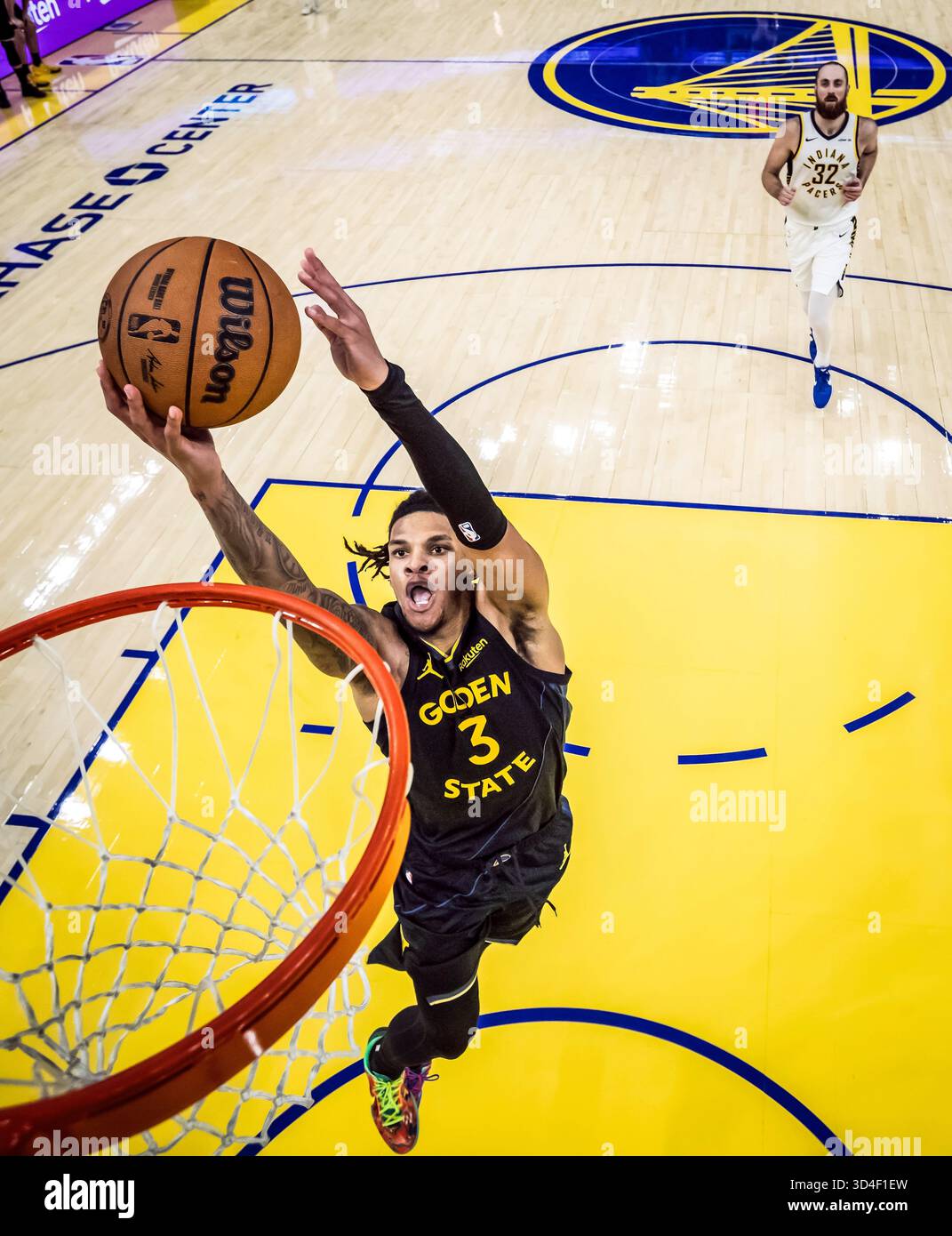 Golden State Warriors' Will Richard (3) goes up for a break away dunk ...