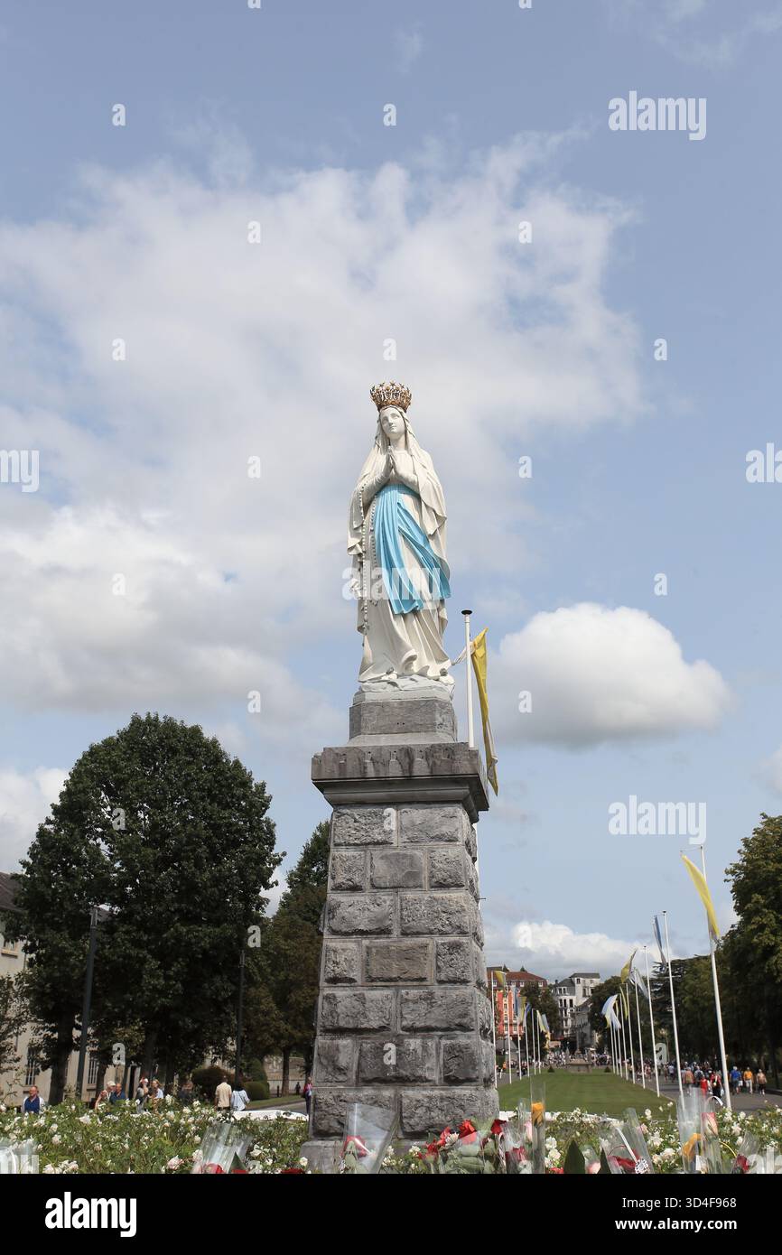 The crowned statue of Our Lady of he Rosary cast in bronze and painted ...