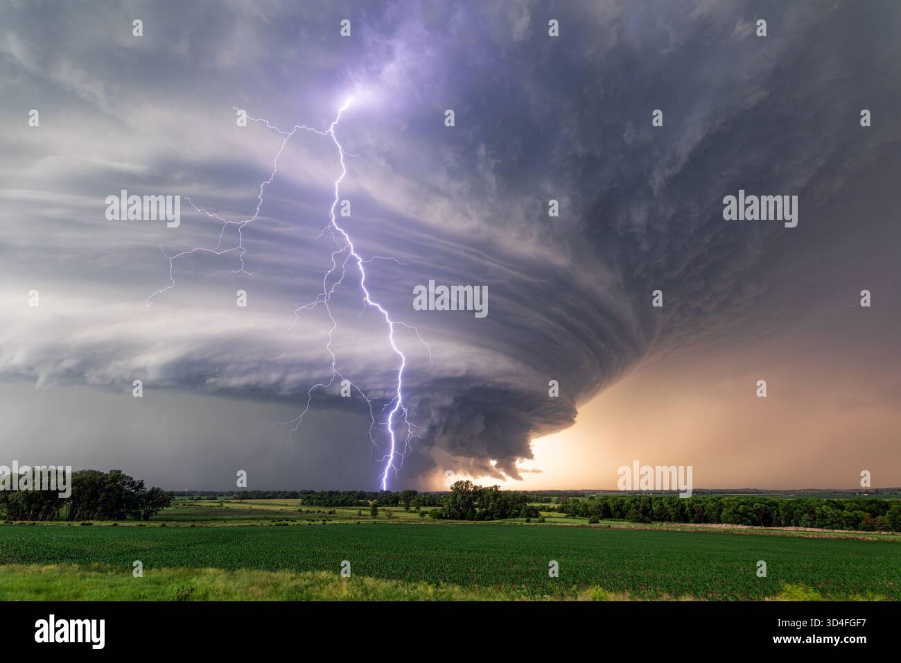 Supercell thunderstorm and lightning strike near Old, Nebraska Stock ...