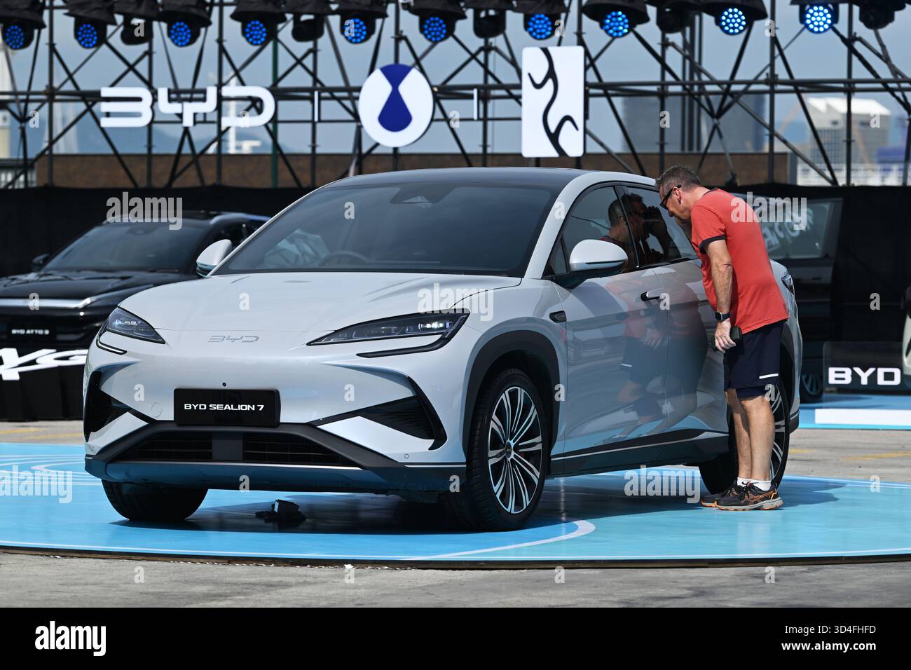 A man testing the BYD electric vehicle (Sealion 7), a Chinese carmaker ...