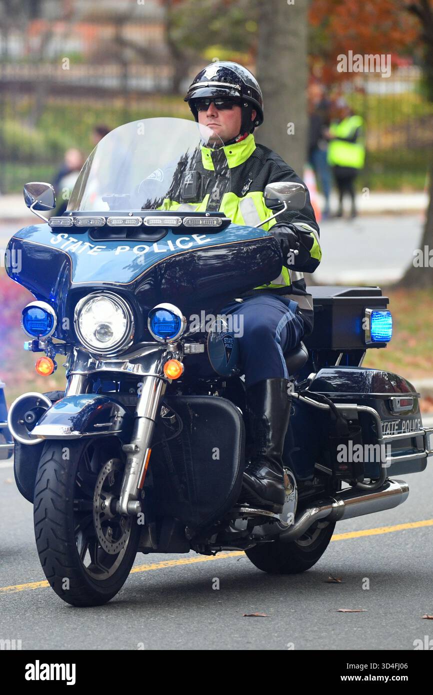 BOSTON, MA - NOVEMBER 09: A Massachusetts State Trooper drives a ...