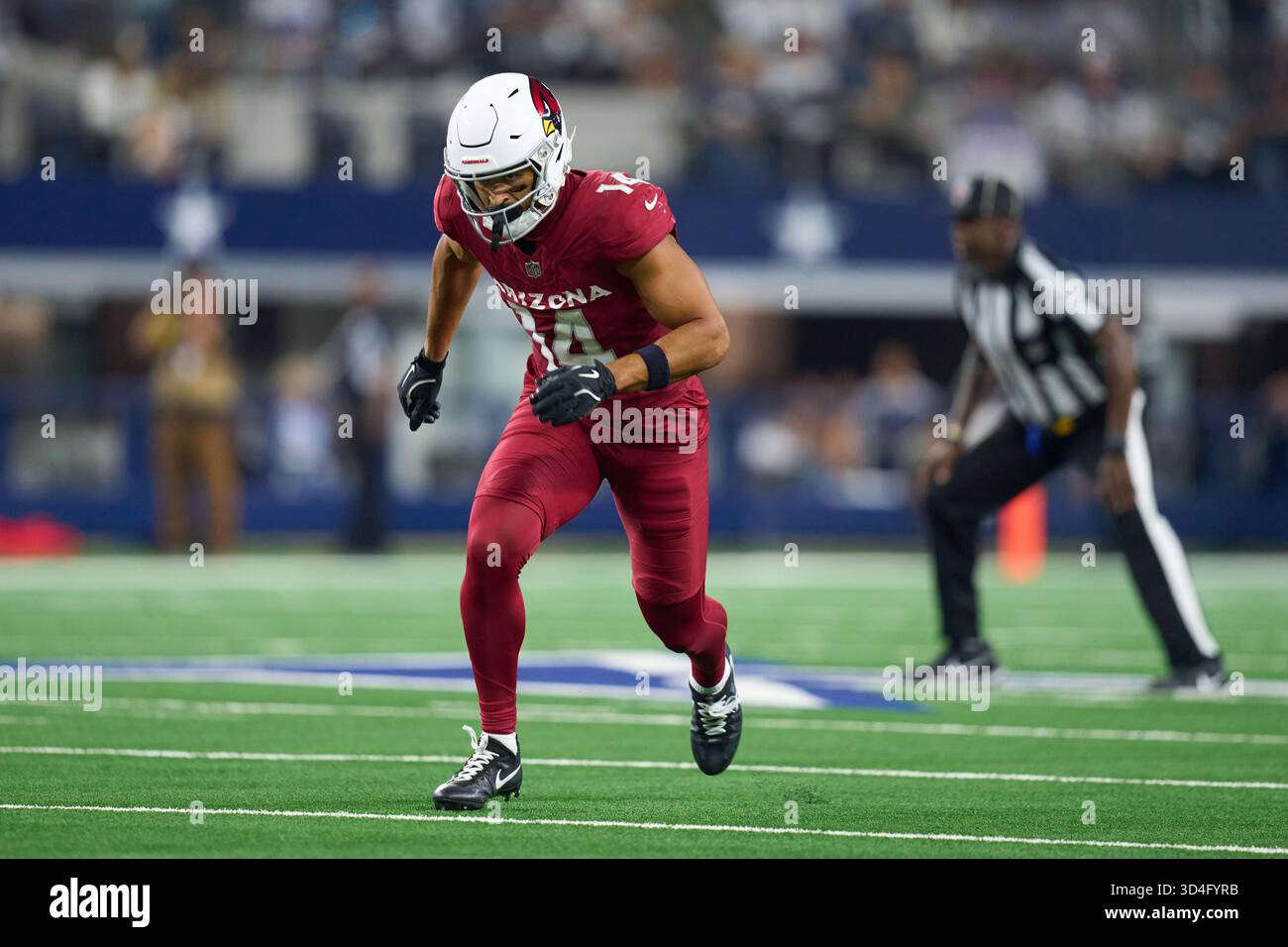 Arizona Cardinals wide receiver Michael Wilson (14) runs a route during ...