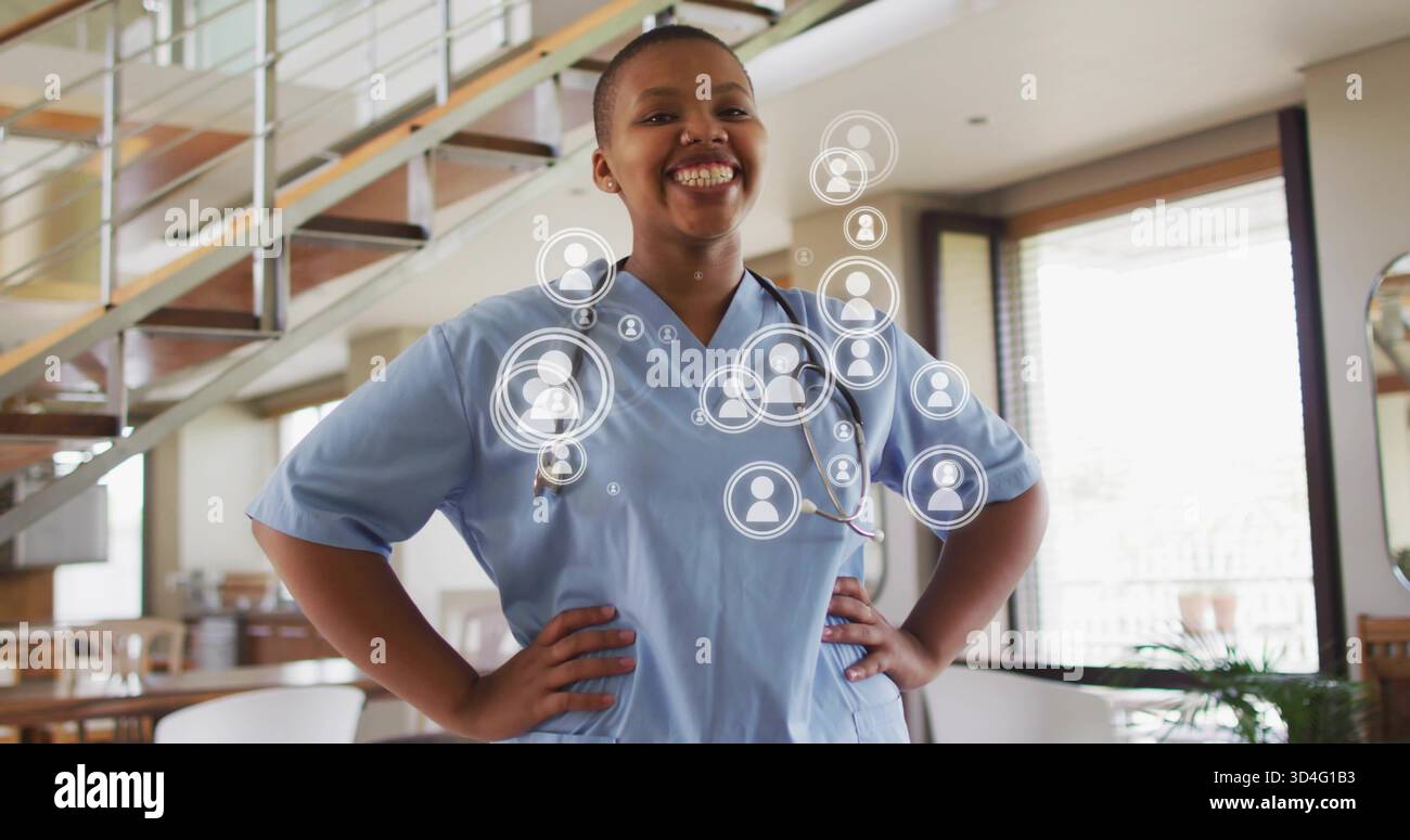 Standing nurse wearing light blue scrubs and stethoscope in modern home ...
