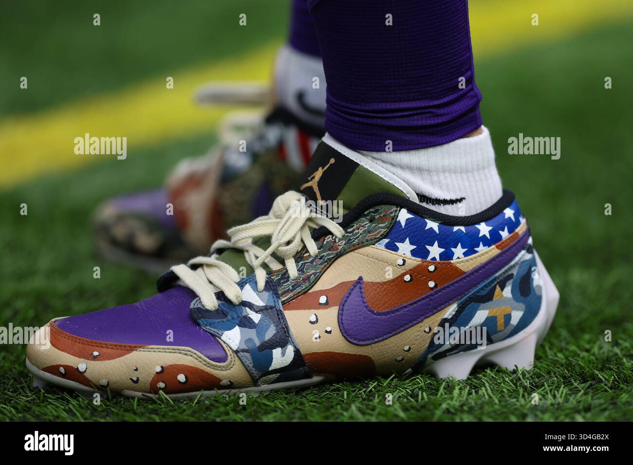 A detail view of Minnesota Vikings wide receiver Adam Thielen's cleats ...