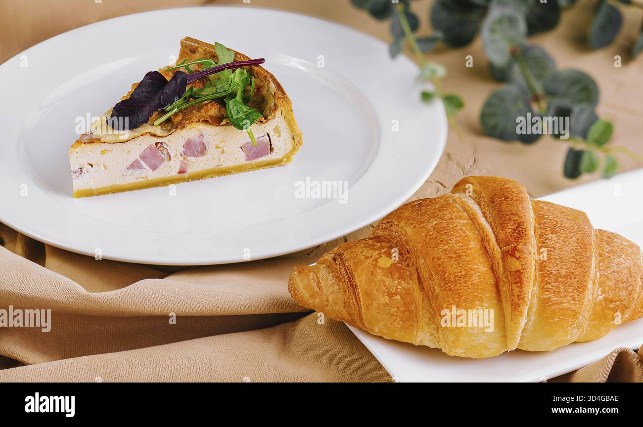 Food, Quiche Lorraine and croissant on White Plates Stock Photo - Alamy