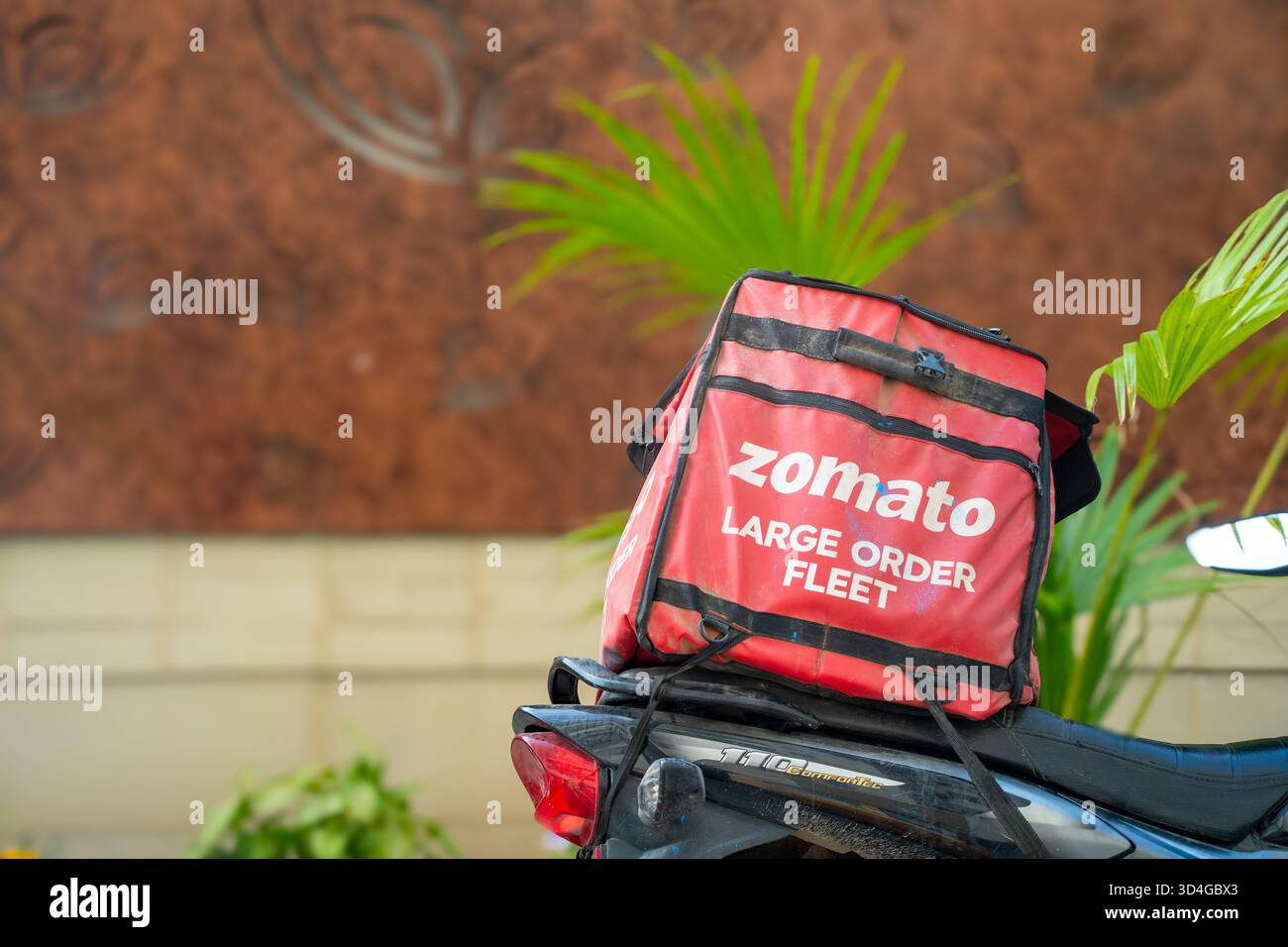 Red bag of Zomato online delivery showing large order fleet on a ...