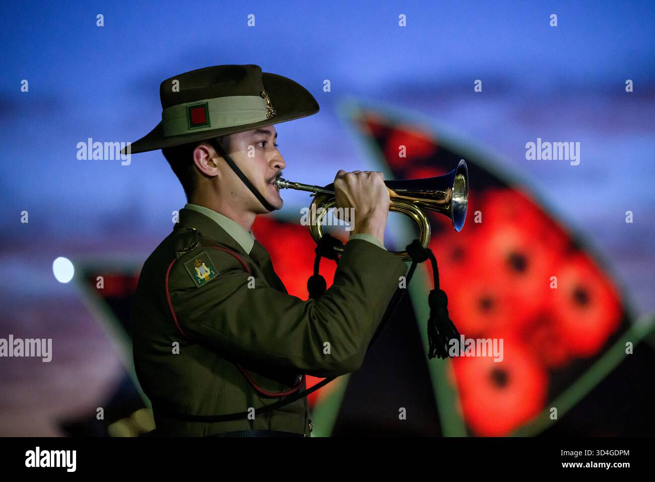 MUSN Jacob Legaspi, bugler for Australian Army Band Sydney, plays ‘The ...