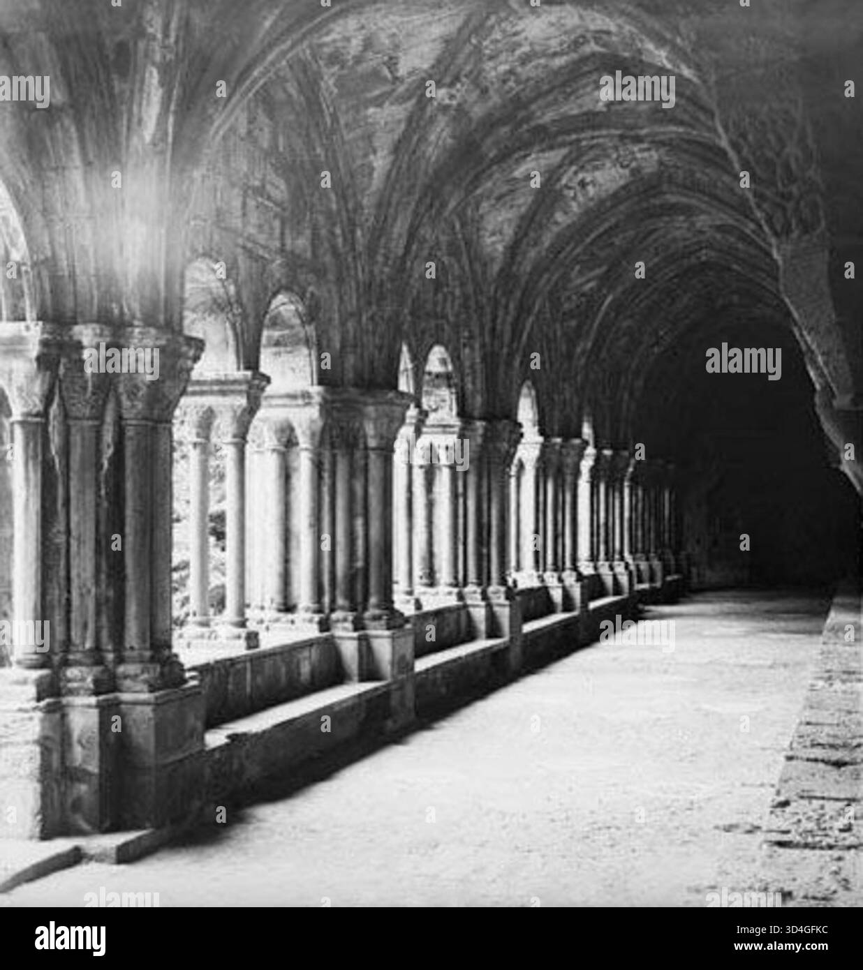 This photo features the cloister of Poblet Monastery, a UNESCO World ...