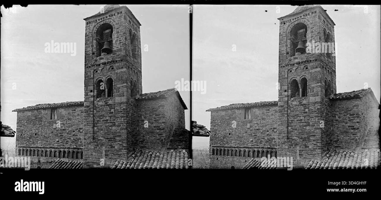 A photograph of the bell tower of a Romanesque church, captured by ...