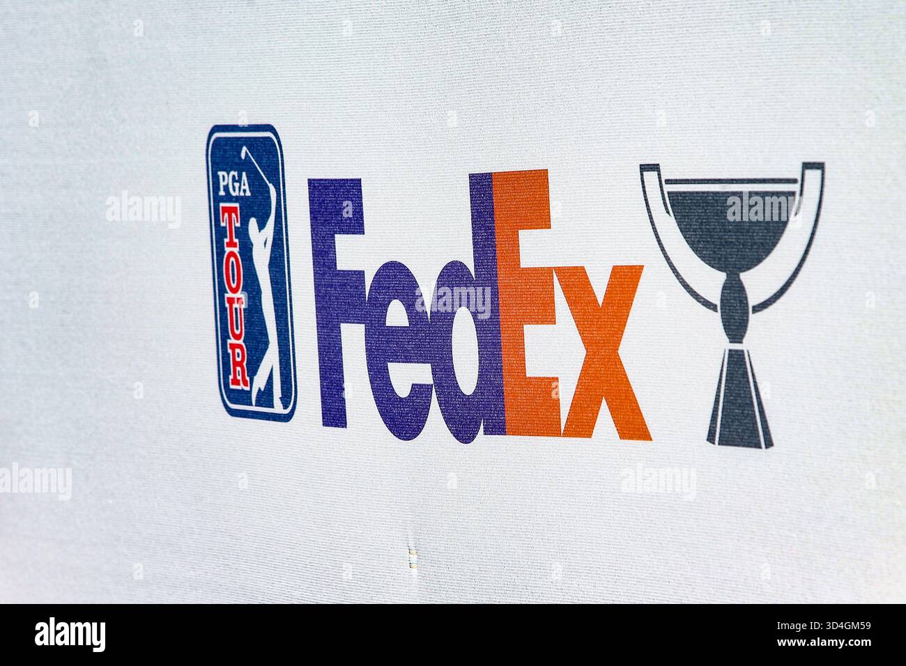 FILE - Banner reads "FedEx," with the PGA Tour logo during the final ...