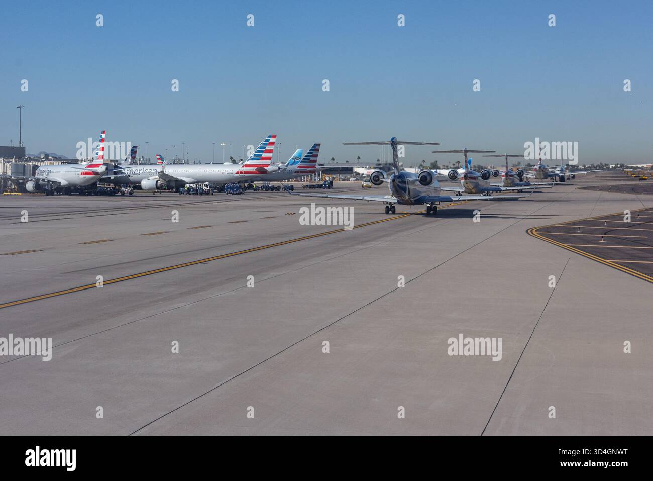 PHOENIX, ARIZONA, USA, NOVEMBER 09, 2025: A view through an airplane ...