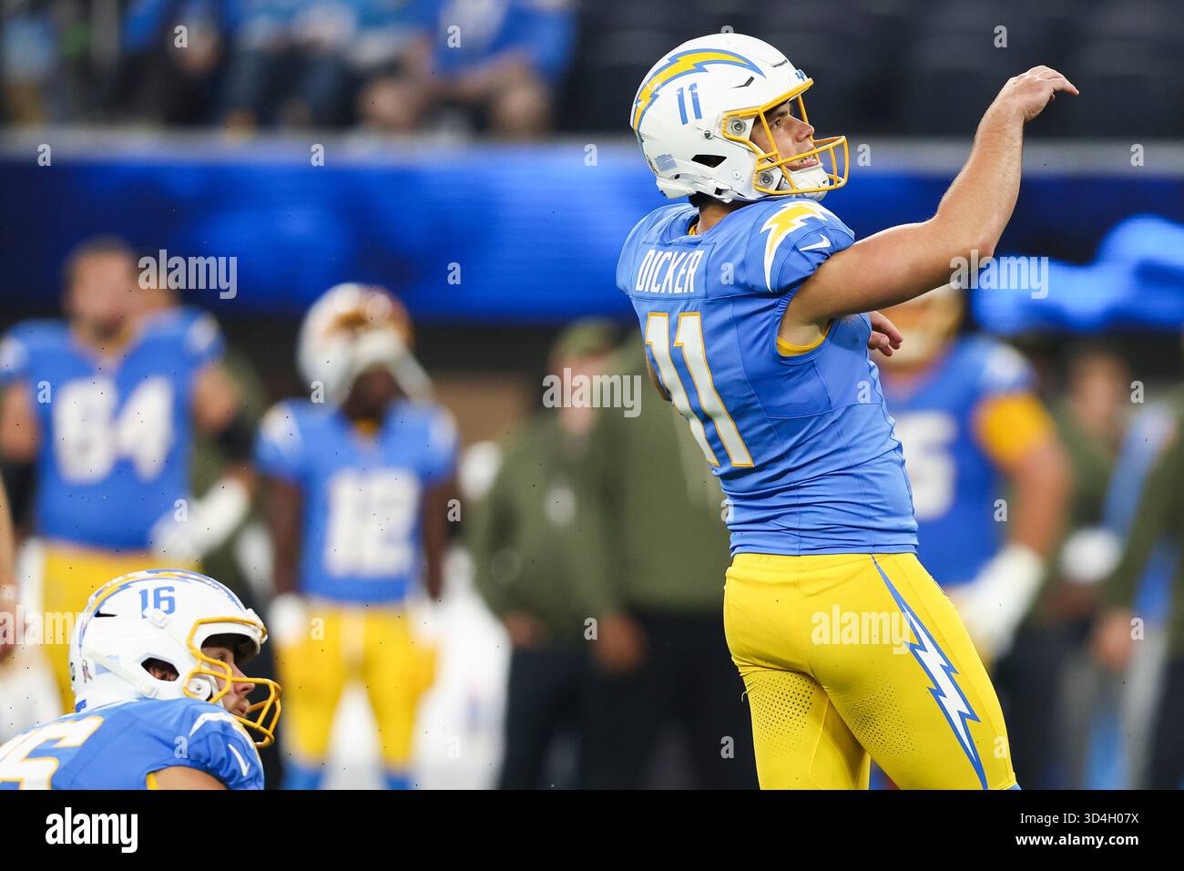 Los Angeles Chargers place kicker Cameron Dicker (11) looks on after ...