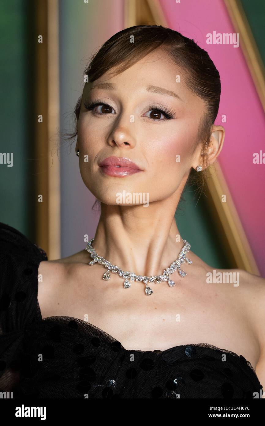 Ariana Grande poses for photographers upon arrival at the premiere of ...