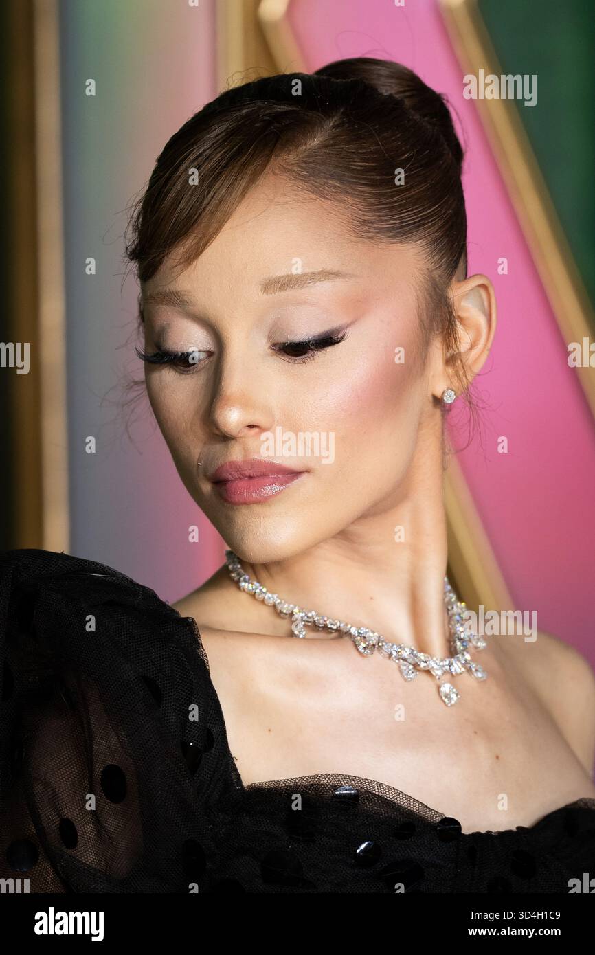 Ariana Grande poses for photographers upon arrival at the premiere of ...