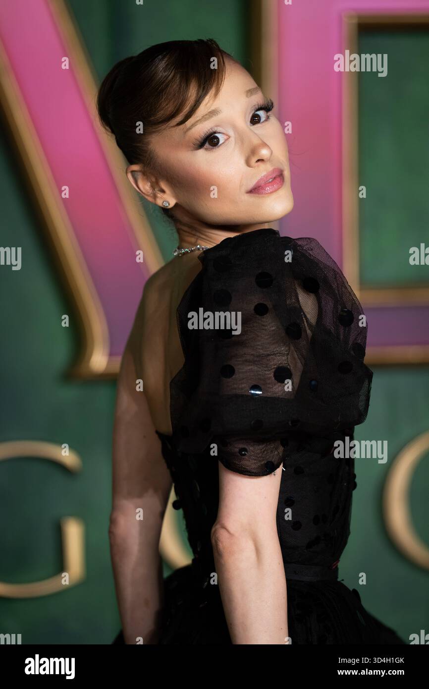 Ariana Grande poses for photographers upon arrival at the premiere of ...