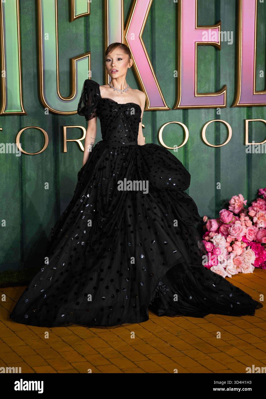 Ariana Grande poses for photographers upon arrival at the premiere of ...
