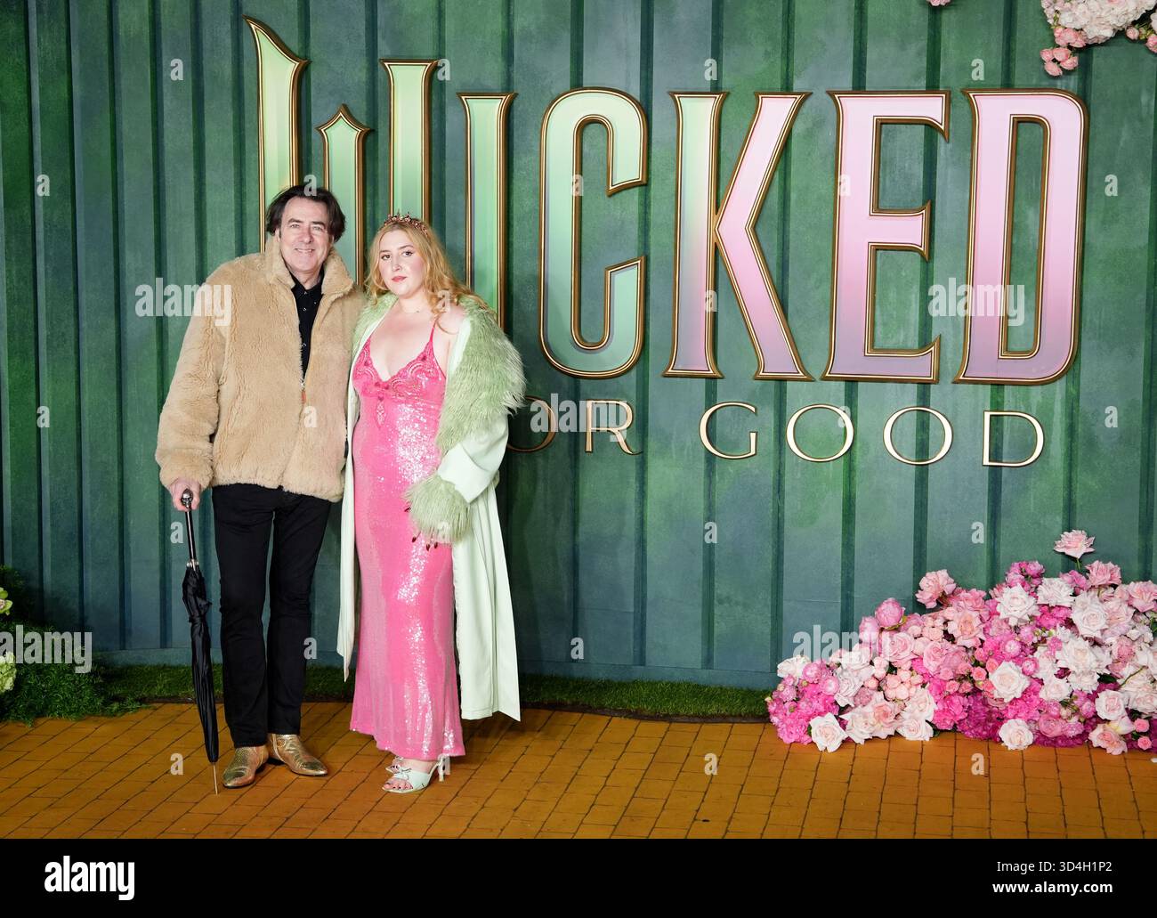 Jonathan Ross (left) and Honey Ross arriving for the European premiere ...