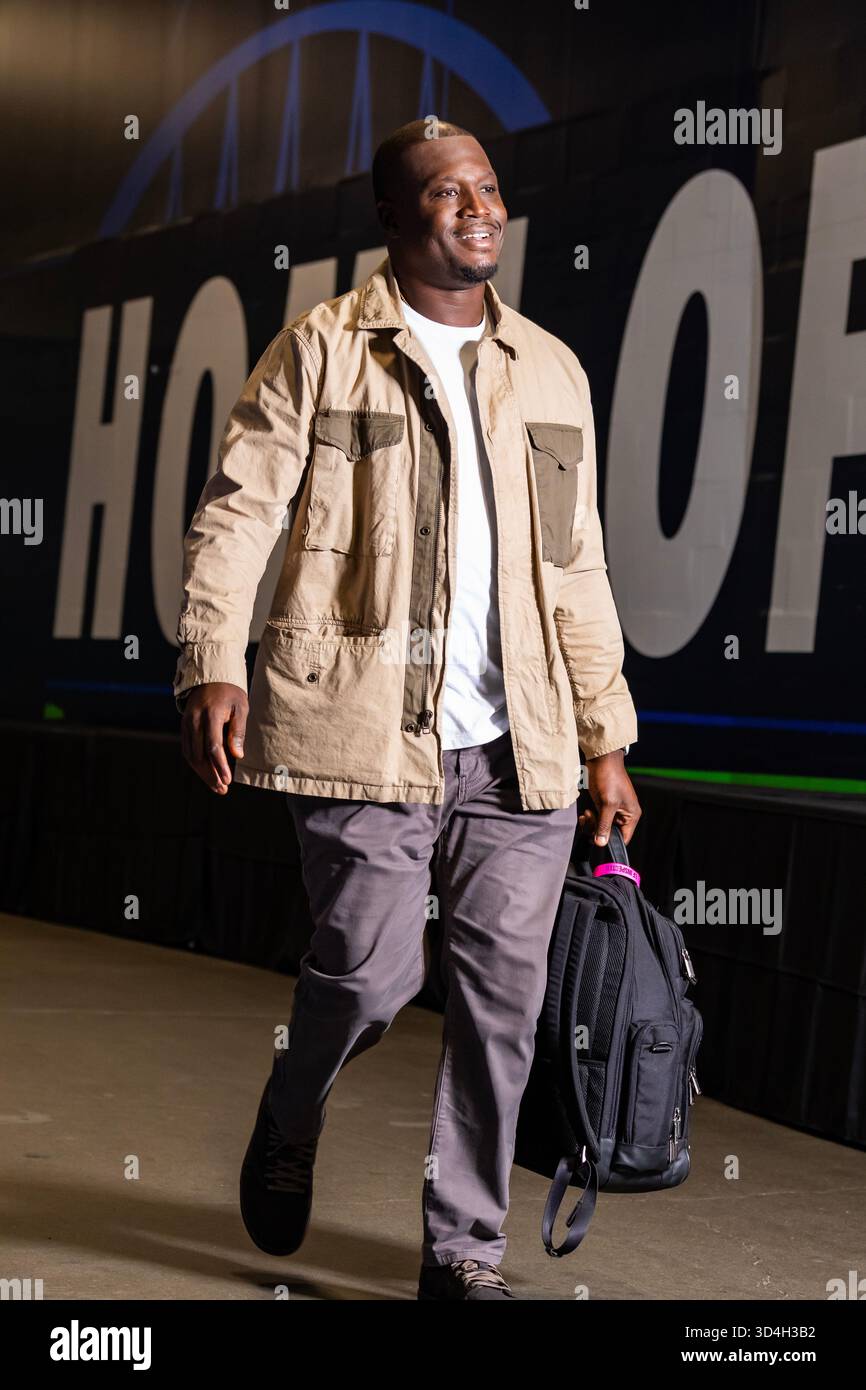 Seattle Seahawks assistant coach Karl Scott arrives before an NFL ...