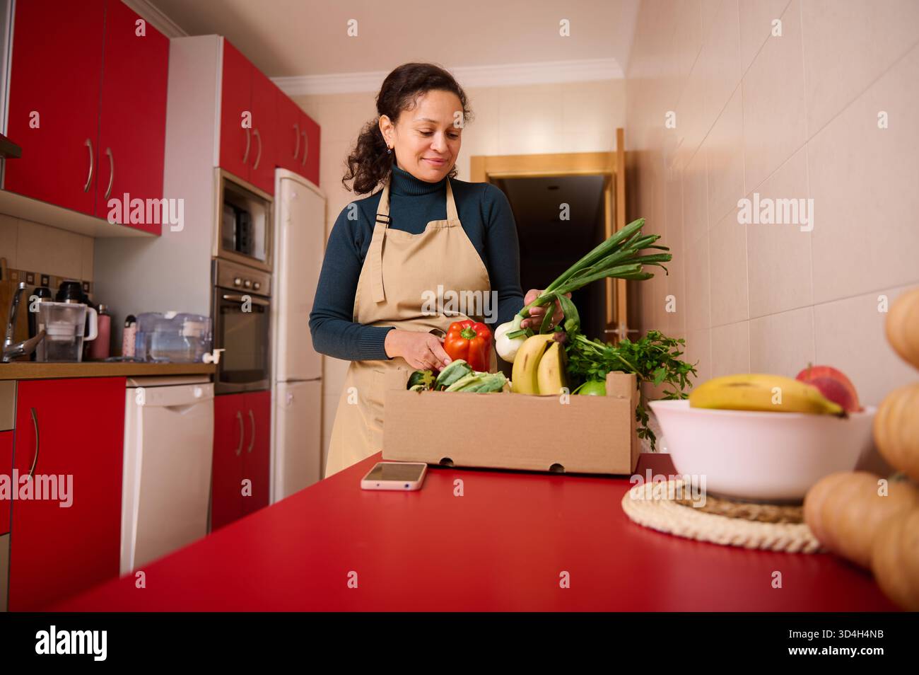 Woman sorting groceries top hi-res stock photography and images - Alamy