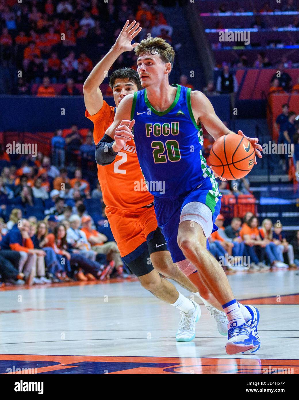 Florida Gulf Coast's J.R. Konieczny drives past Illinois' Andrej ...