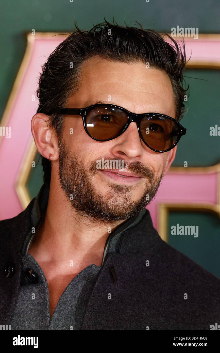 Jonathan Bailey poses for photographers upon arrival at the premiere of ...