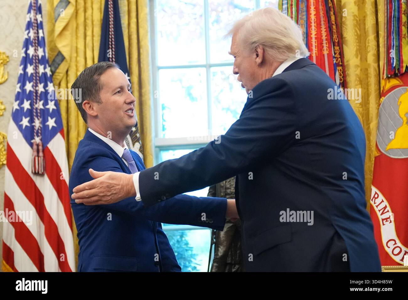 President Donald Trump shakes hands with U.S. Ambassador to India Sergio Gor in the Oval Office ...