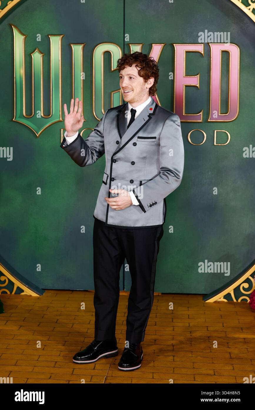 Ethan Slater poses for photographers upon arrival at the premiere of ...