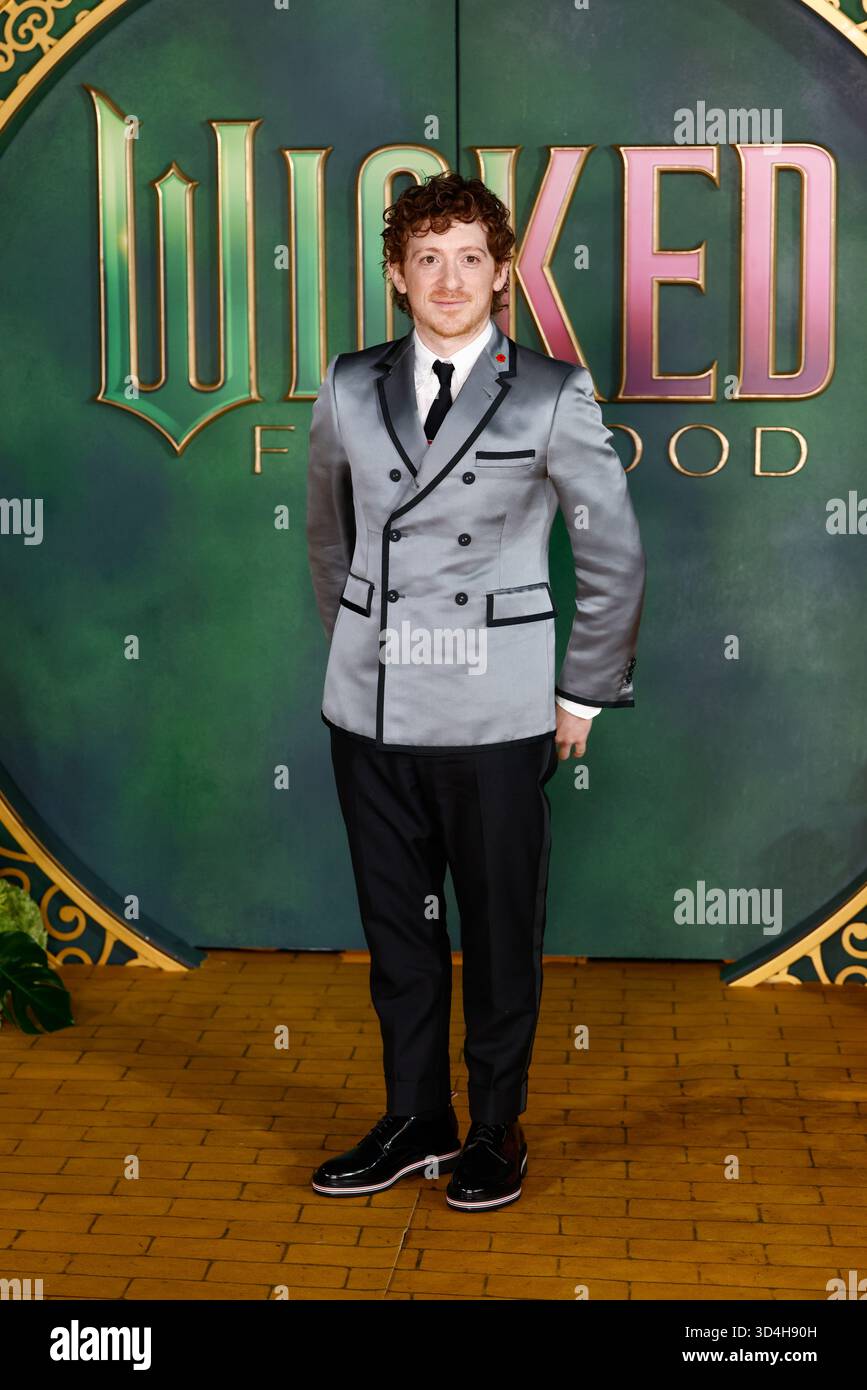 Ethan Slater poses for photographers upon arrival at the premiere of ...
