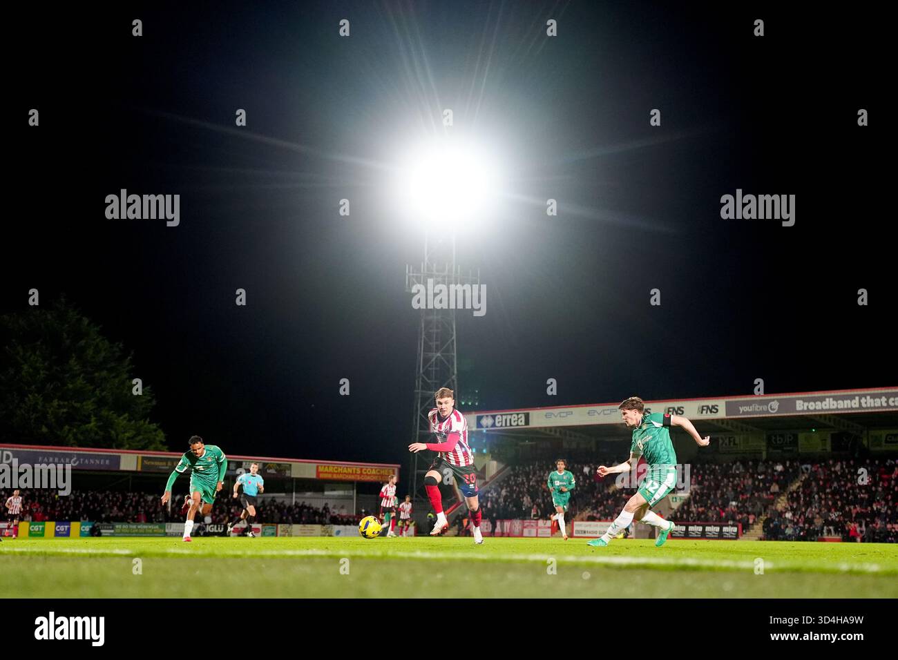 Cheltenham Town's Jake Bickerstaff (centre) in action during the Sky ...