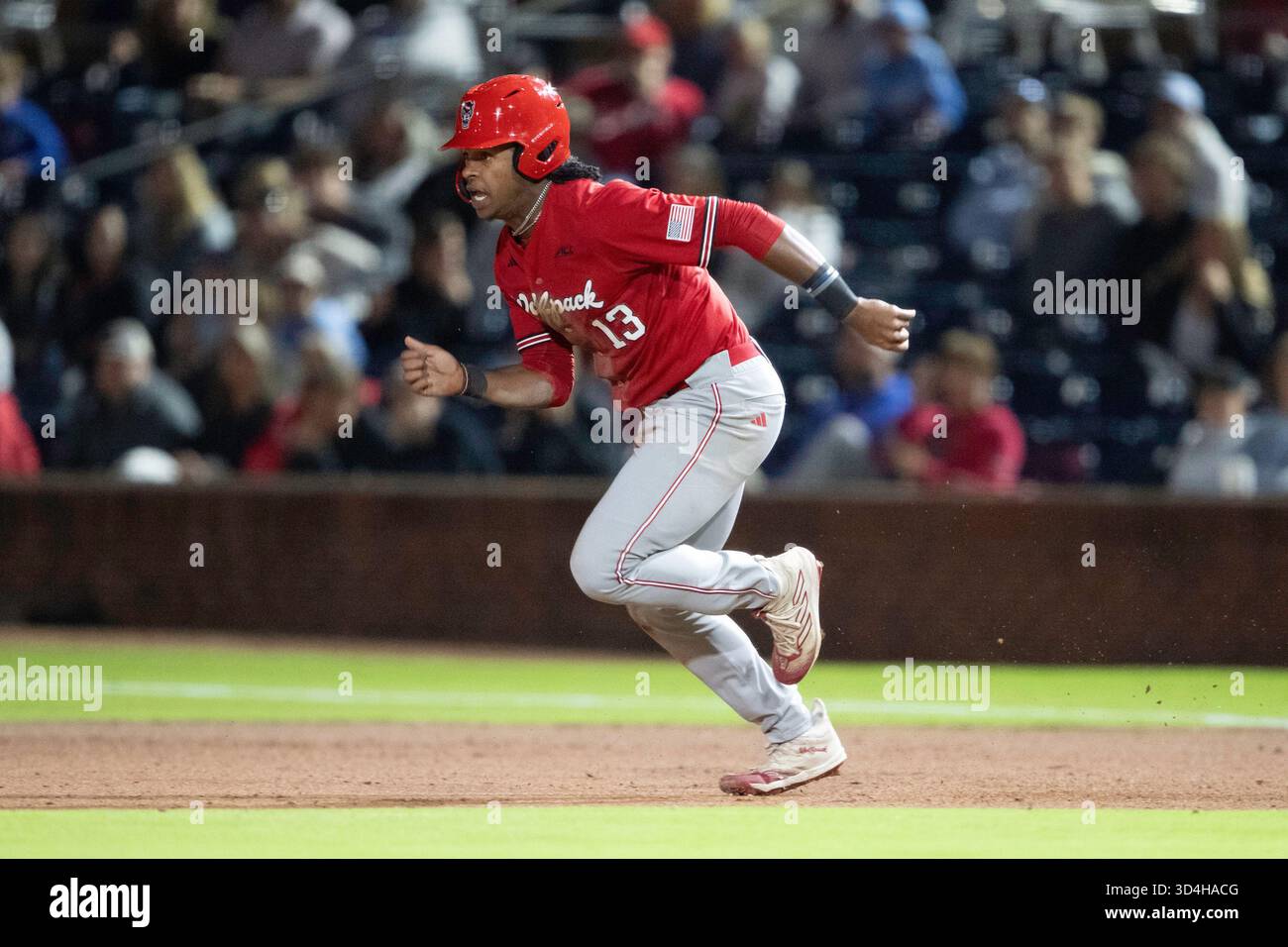 Andrew Wiggins (13) of the NC State Wolfpack runs towards second base ...