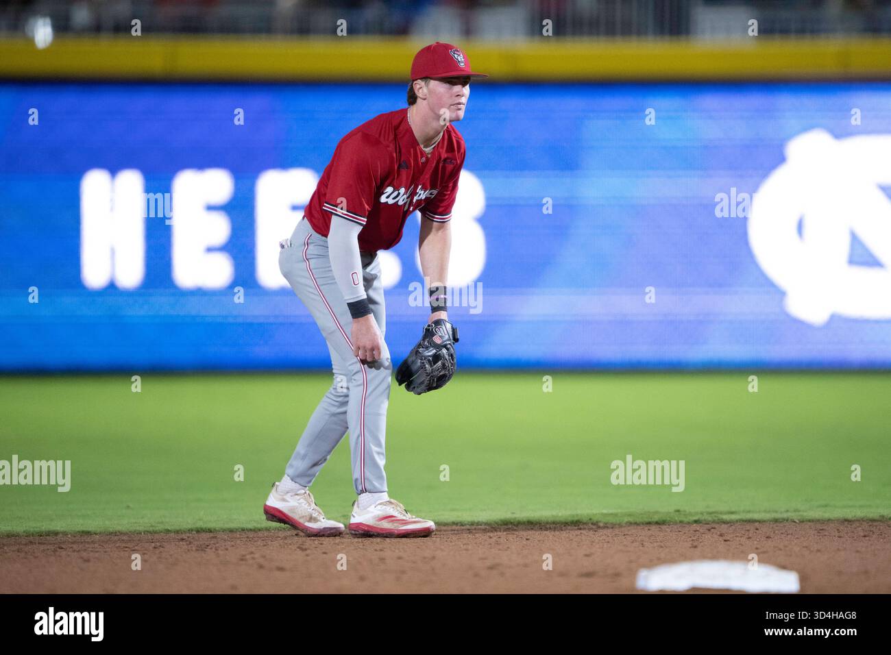 Second baseman Luke Nixon (0) of the NC State Wolfpack in action during ...