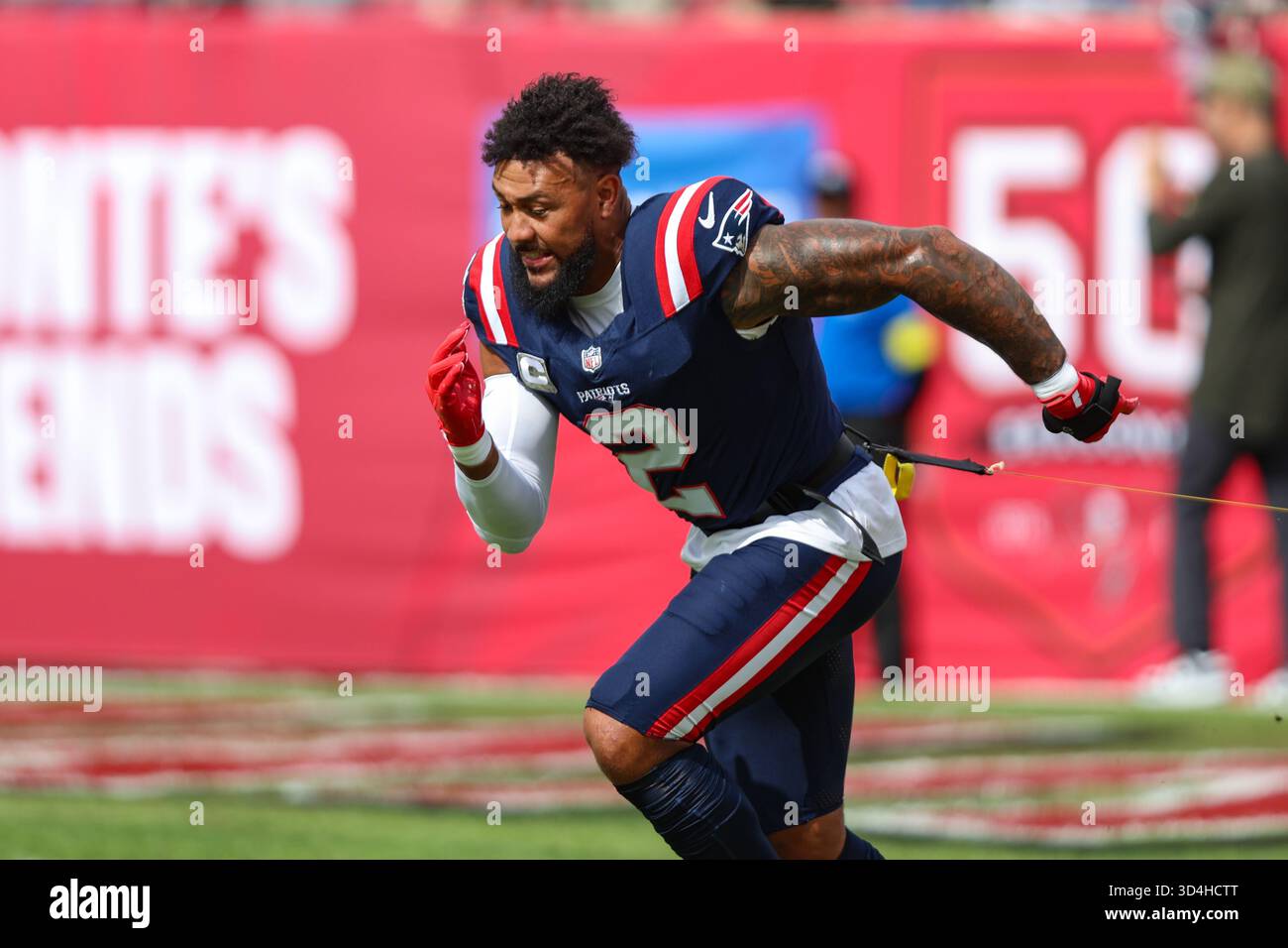 New England Patriots linebacker Harold Landry III (2) warms up before ...
