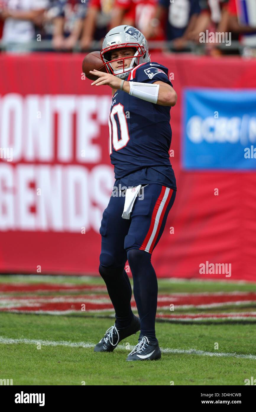 New England Patriots quarterback Drake Maye (10) warms up before an NFL ...